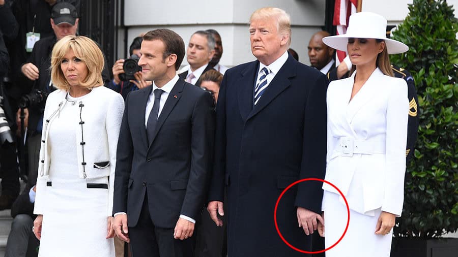 Another awkward hand-holding moment: Melania keeps escaping Trump s ...